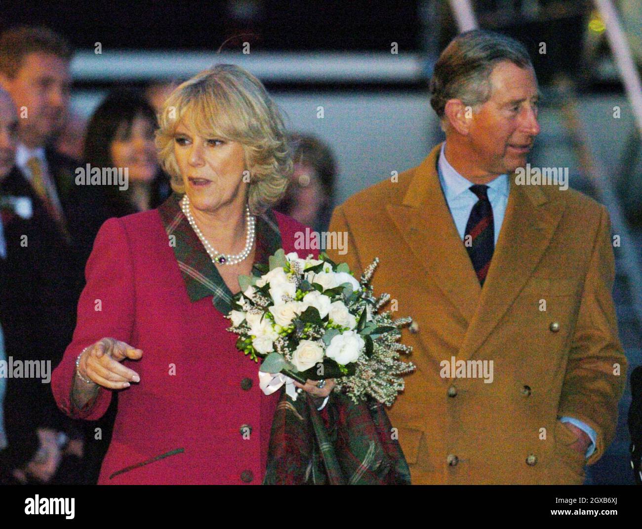 Prince Charles and Camilla Parker Bowles arrive at Aberdeen airport ...
