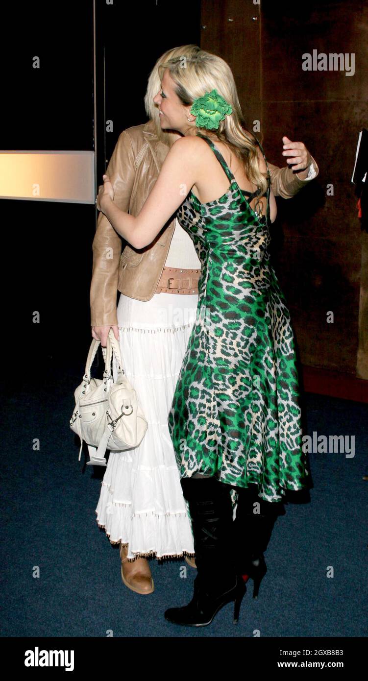 Kate Thornton with Nicole Appleton hugging each other arriving at Hell ...
