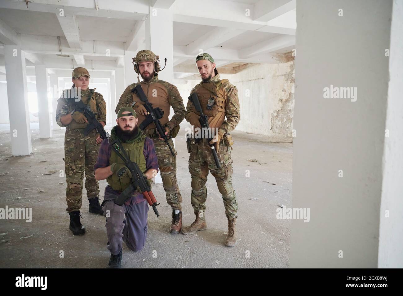 soldier squad team portrait in urban environment relaxed after action ...