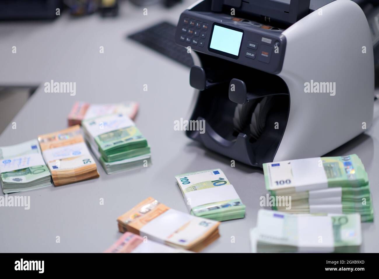 Sorted banknotes placed on the table after it is counted on the ...
