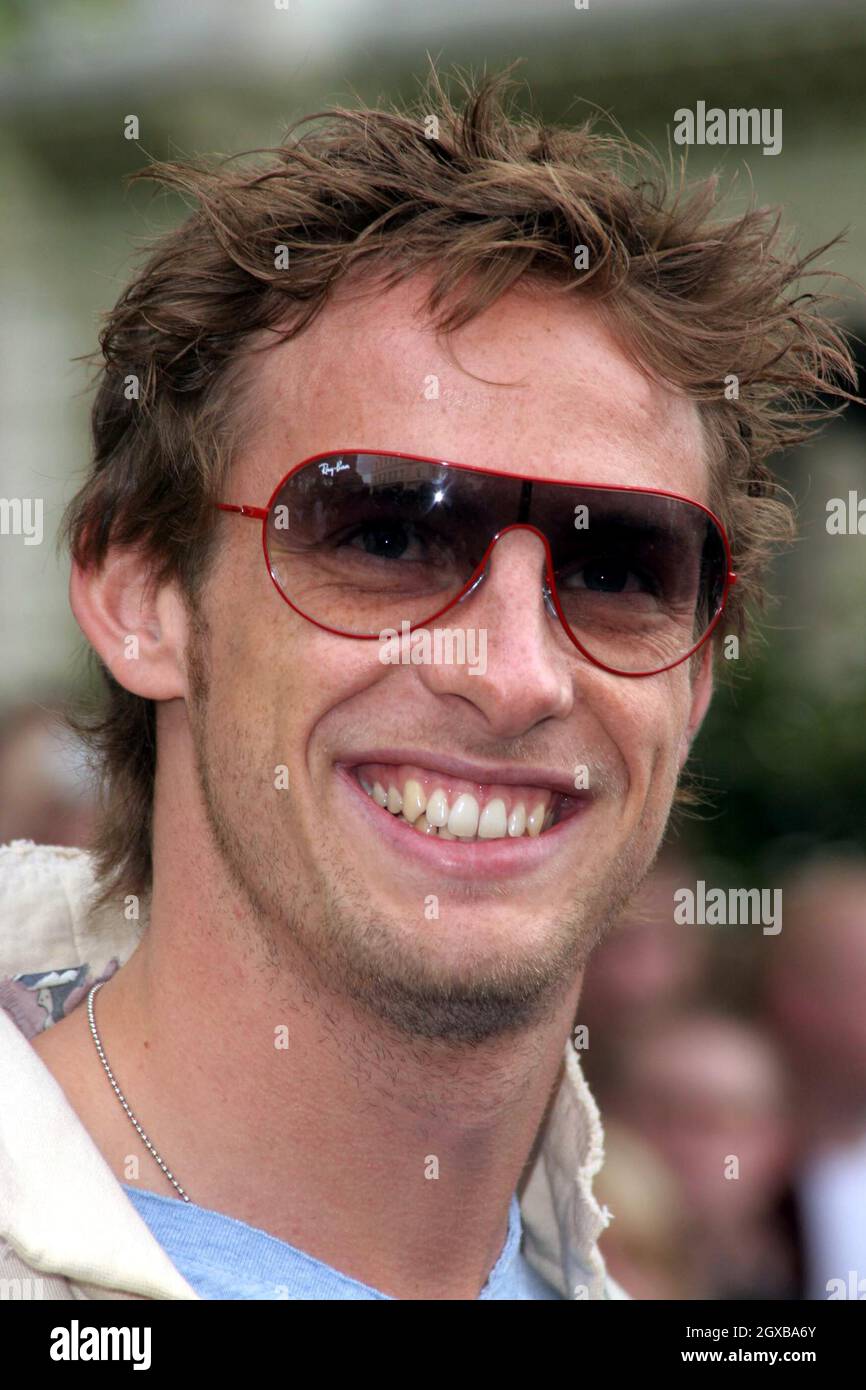 Jenson Button posing for the press before heading the parade drive ...