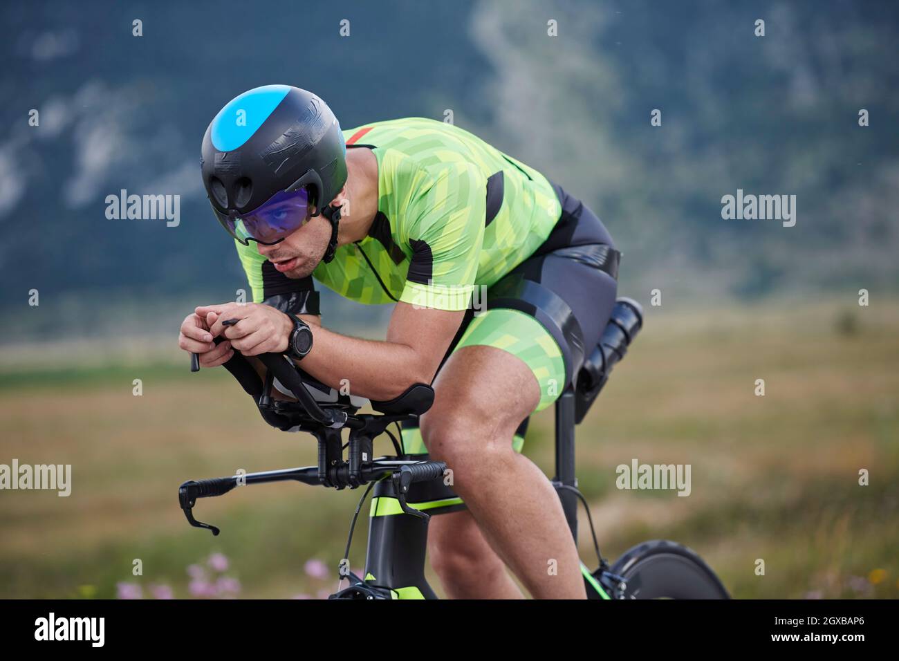 Professional triathlete on her road bike hi-res stock photography and ...