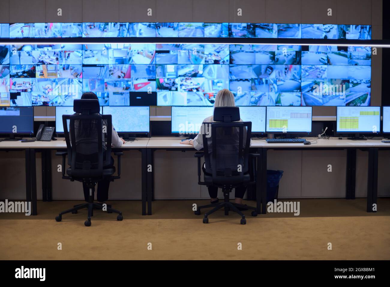 Group of Security data center operators working in a CCTV monitoring ... Group of Security data center operators working in a CCTV monitoring ...