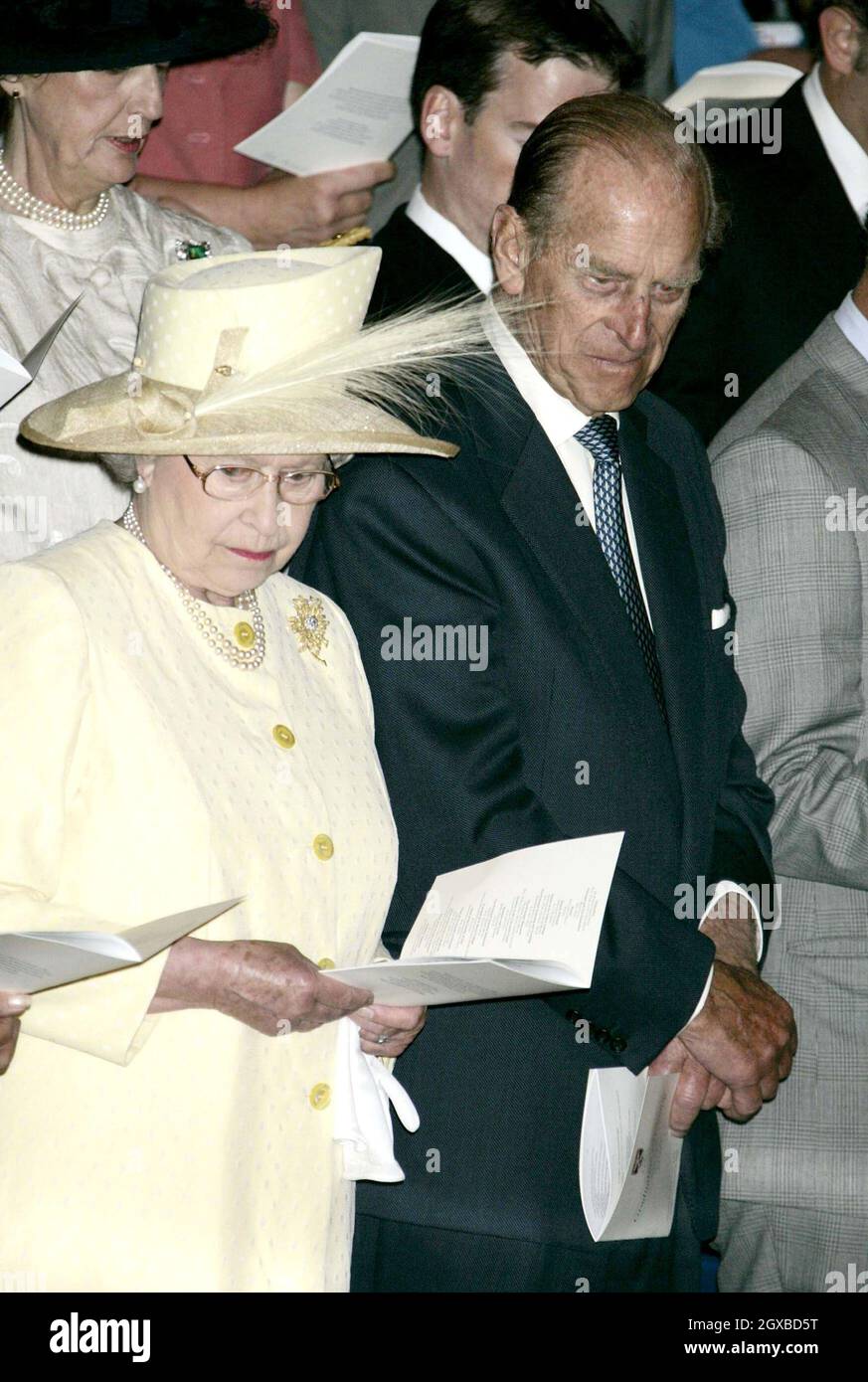 Britain's Queen Elizabeth II and the Duke of Edinburgh stand during ...