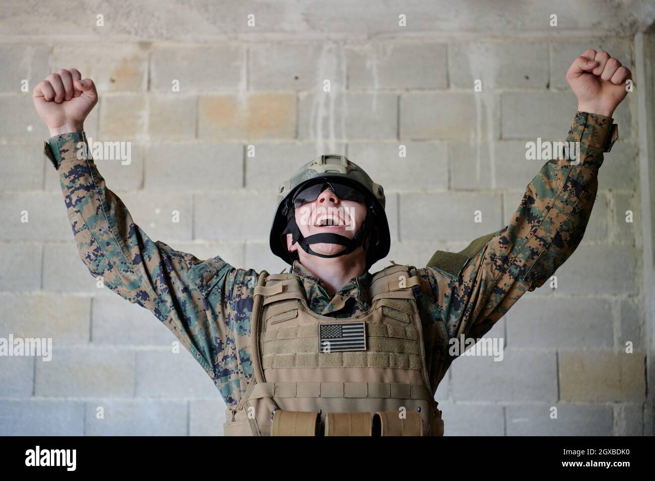 soldier celebrating victory raise arms winner concept Stock Photo - Alamy