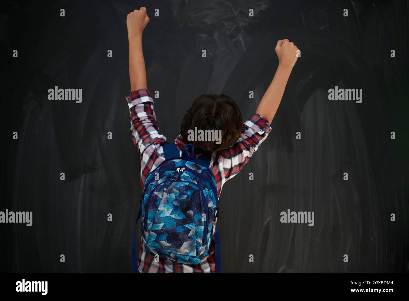 happy arab teenager celebrating wearing backpack casual school look ...