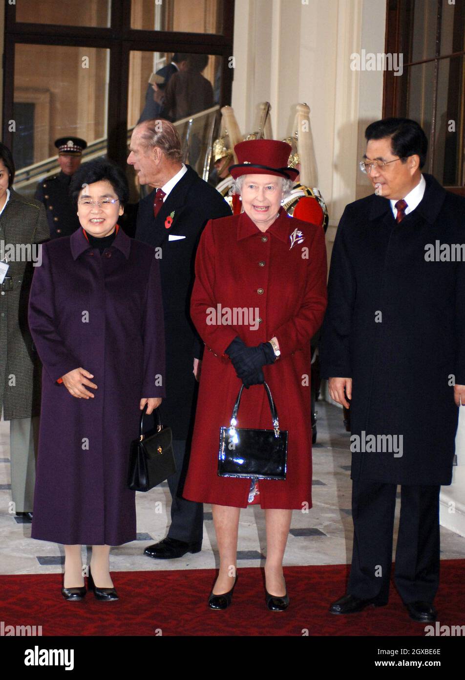 Chinese President Hu Jintao and his wife Liu Yongqing, accompanied by ...