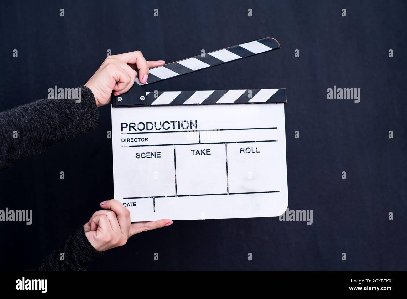 video production movie clapper cinema action and cut concept on black ...