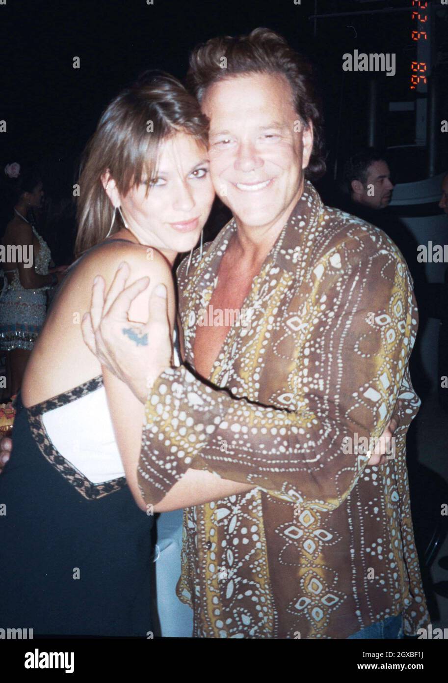 Mickey Rourke and girl in Miami Stock Photo - Alamy