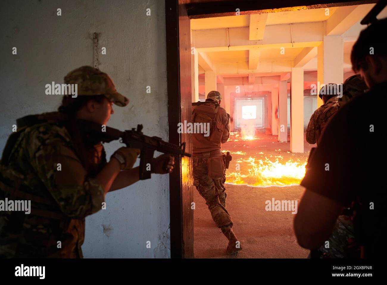 special forces soldiers team in urban environment making tactical ...