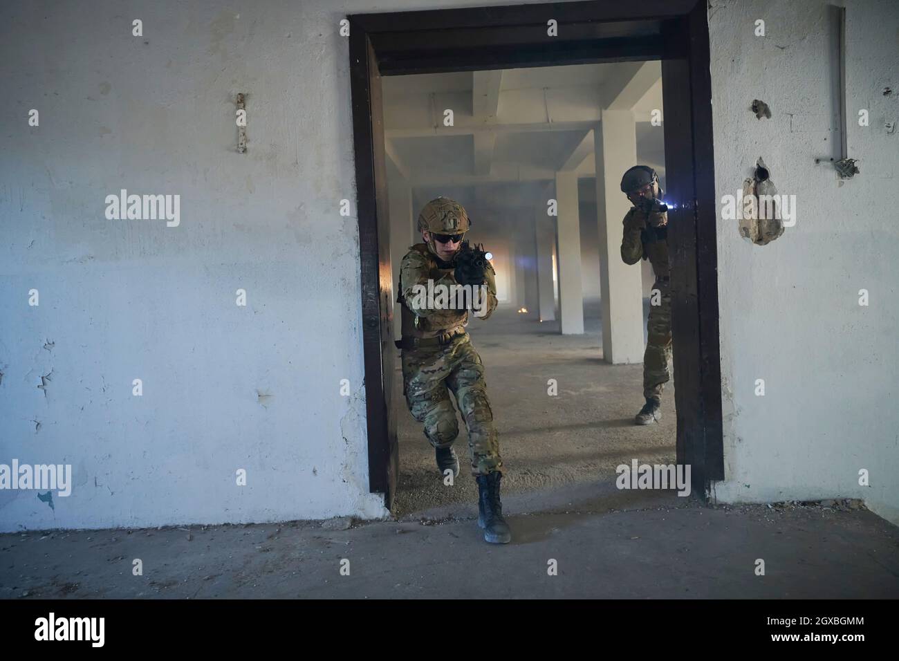 special forces soldiers team in urban environment making tactical ...