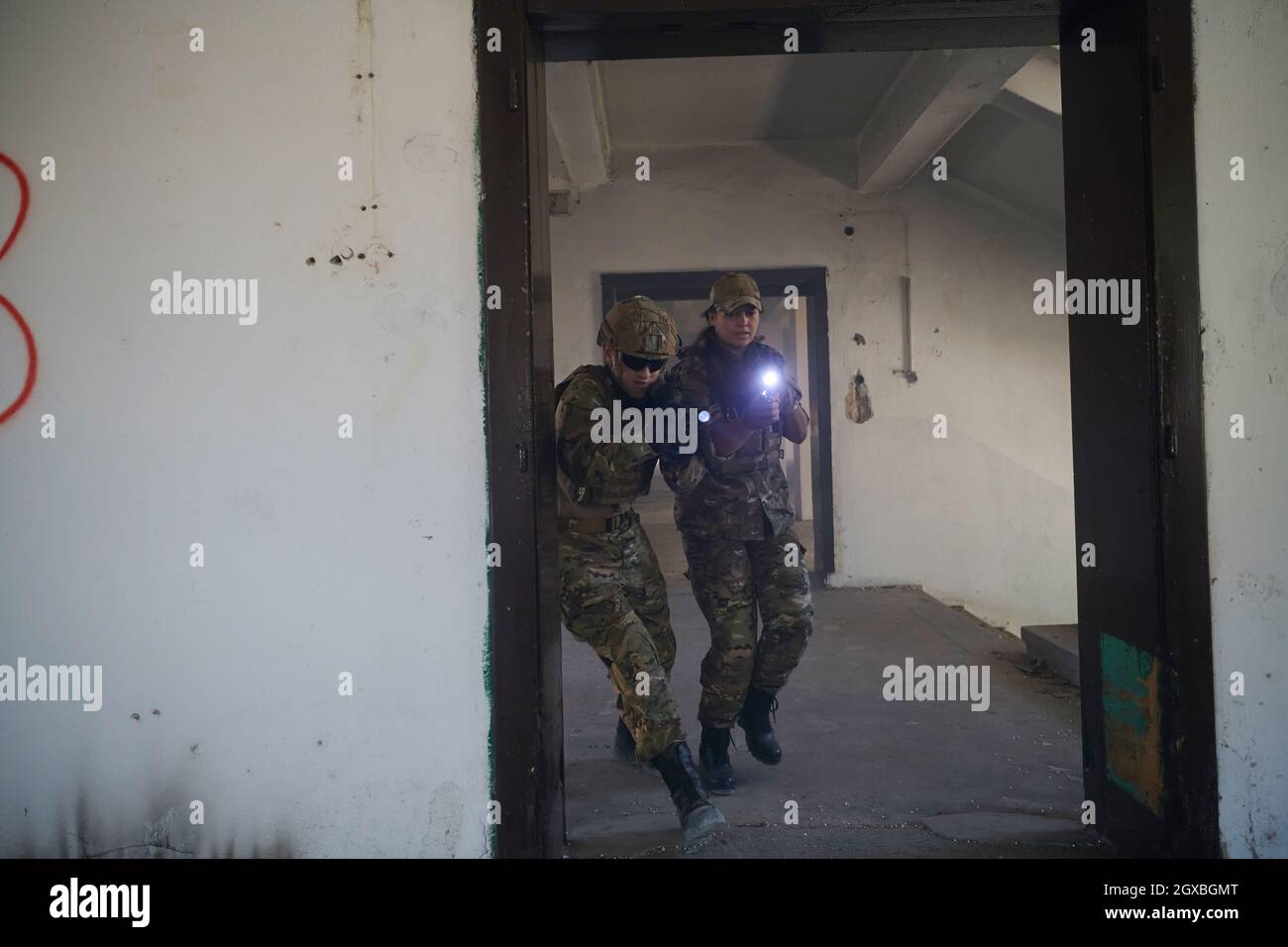 special forces soldiers team in urban environment making tactical ...