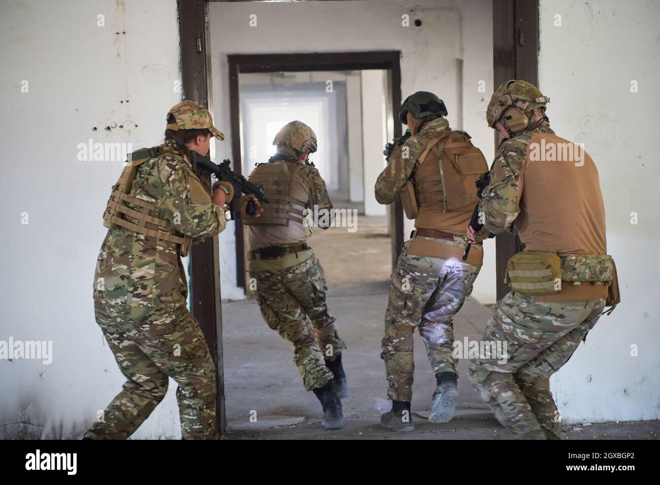 special forces soldiers team in urban environment making tactical ...