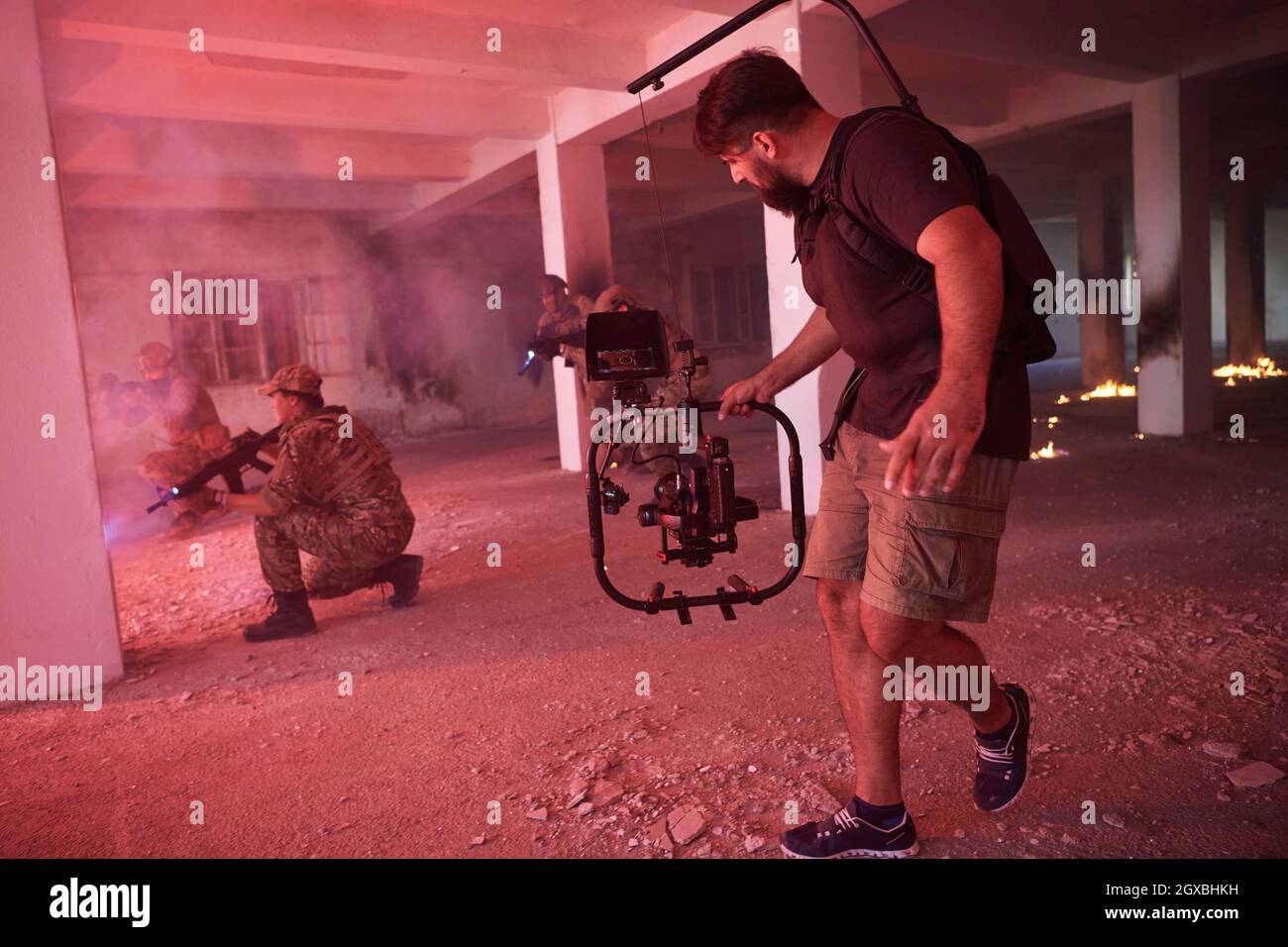 Videographer with Professional Movie Video Camera Gimbal Stabilizing ...