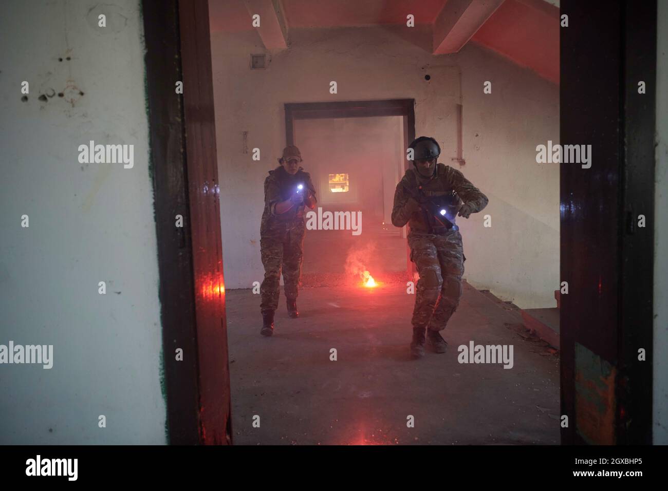 special forces soldiers team in urban environment making tactical ...