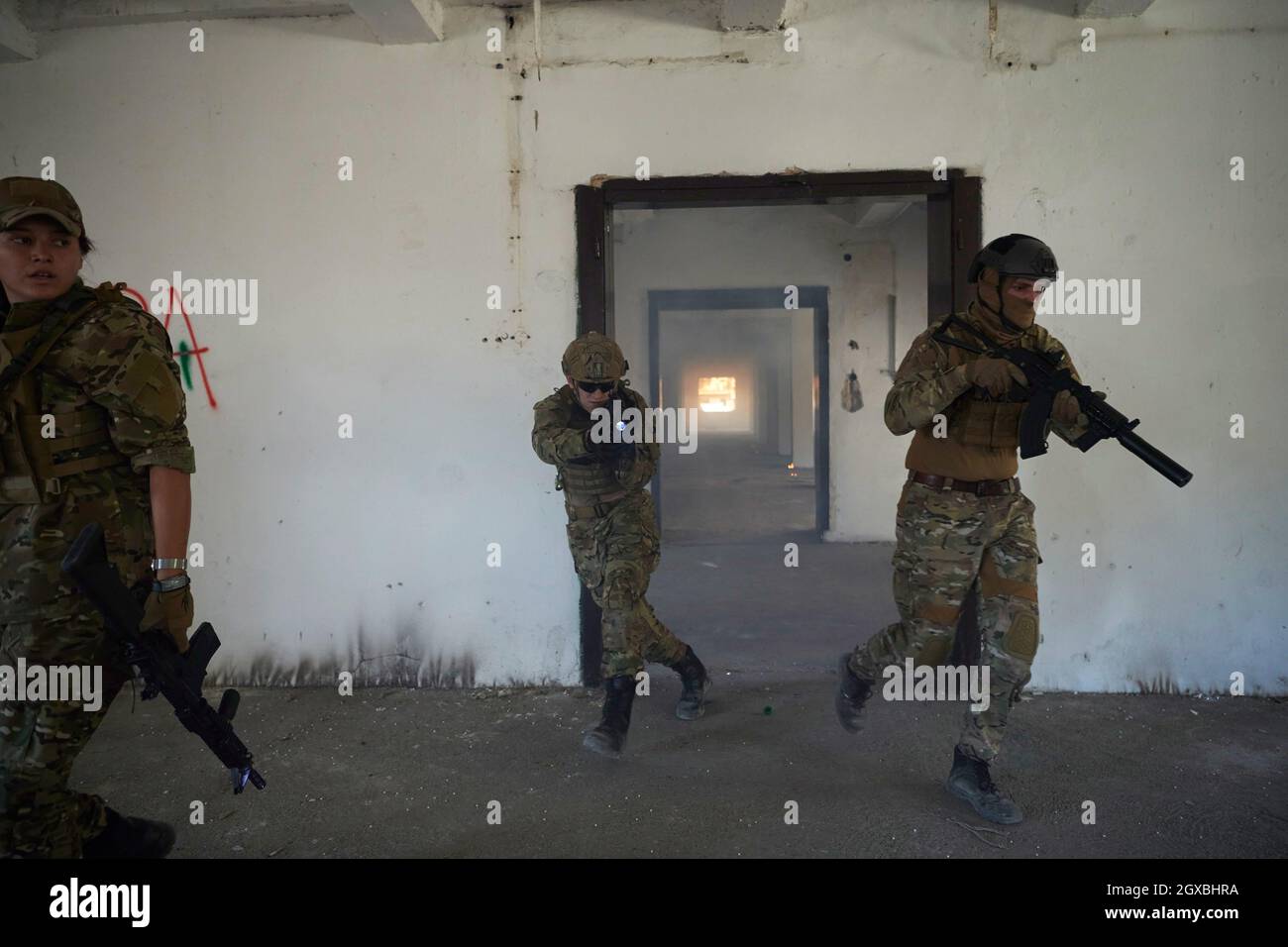 special forces soldiers team in urban environment making tactical ...