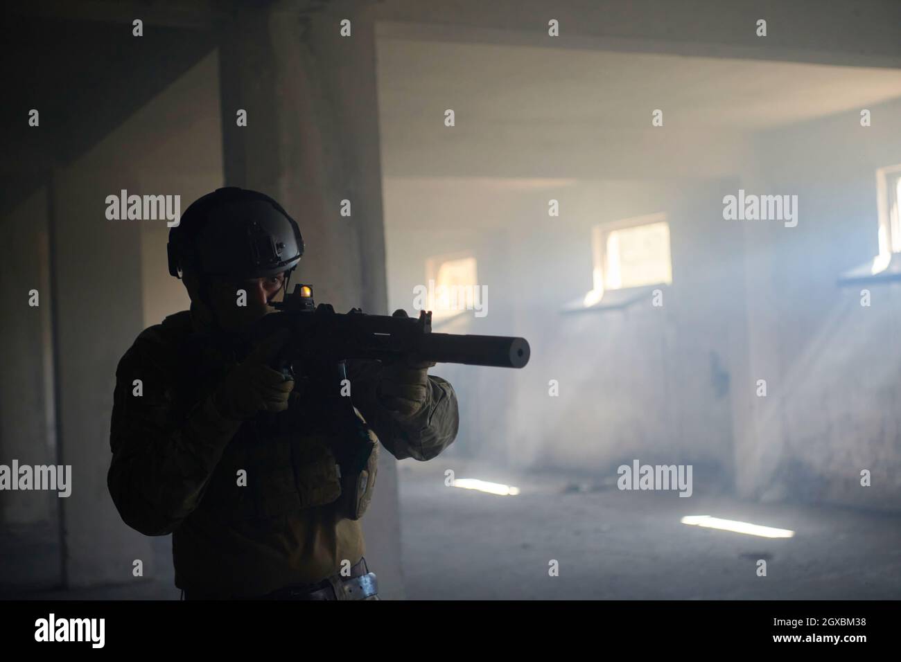 modern warfare soldier in urban environment battlefield aiming on ...
