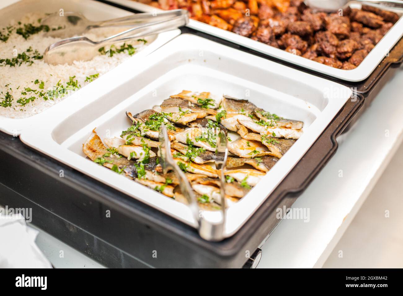Food served catering at the party, grilled fish Stock Photo - Alamy