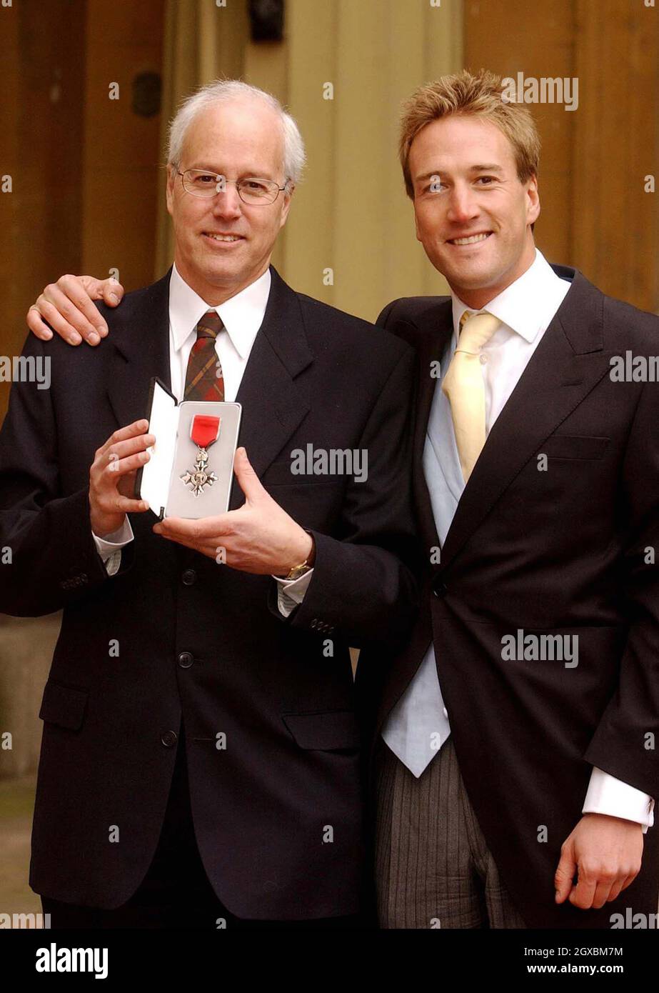 Dr Bruce Fogle with son TV presenter Ben proudly holds his MBE, after ...