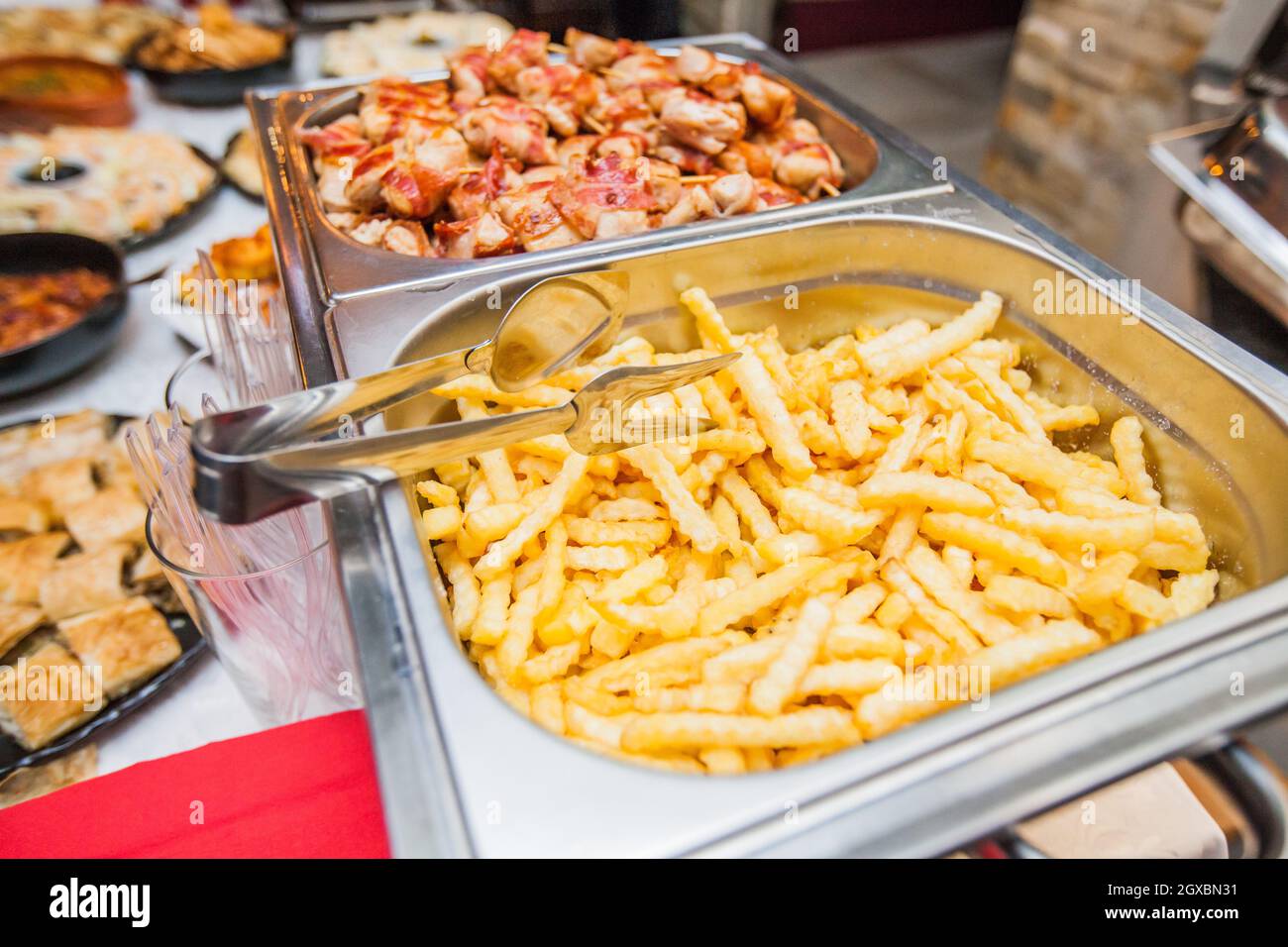 French fries served in event dish Stock Photo - Alamy