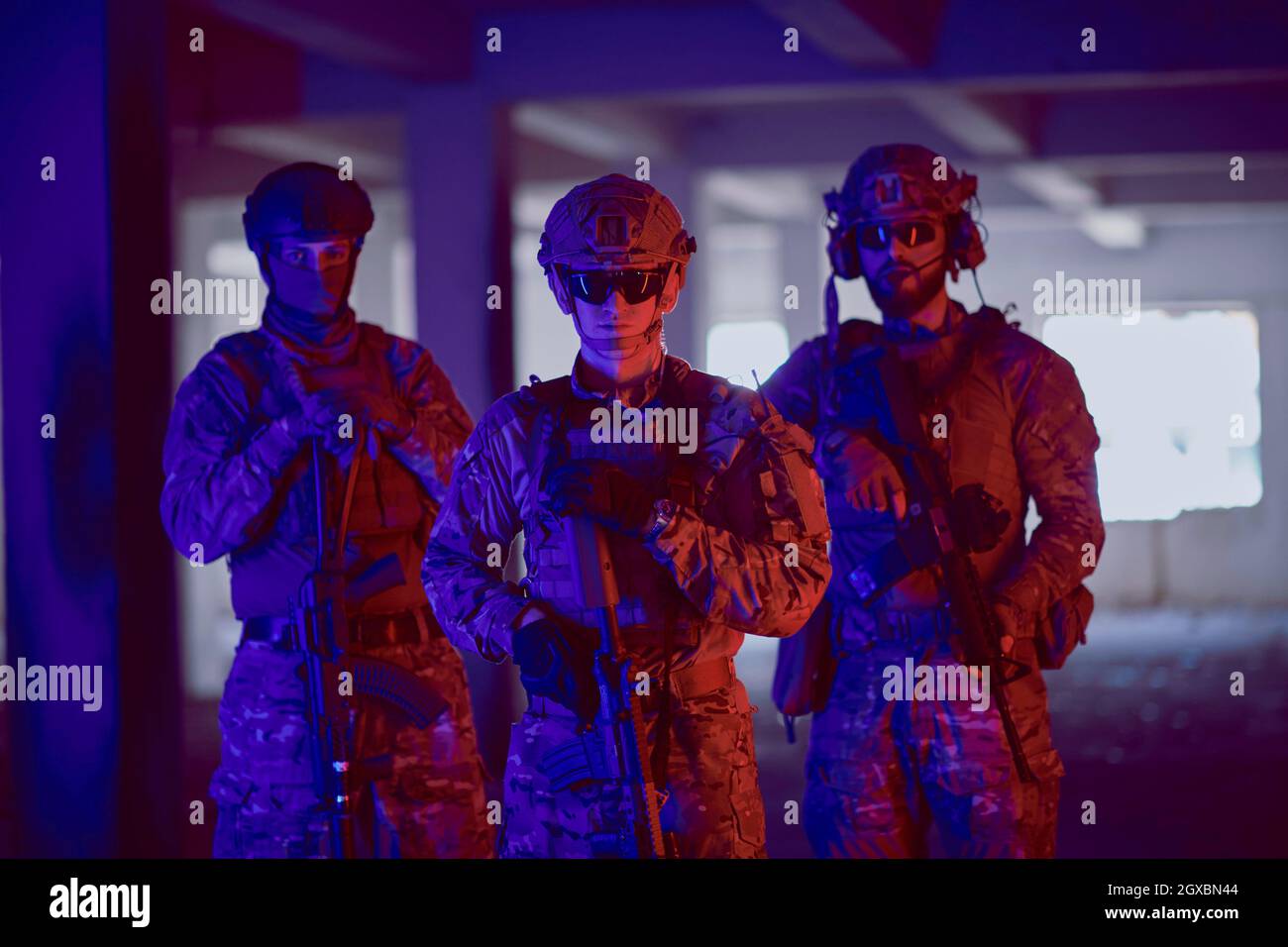soldier squad team portrait in urban environment colored neon lights ...