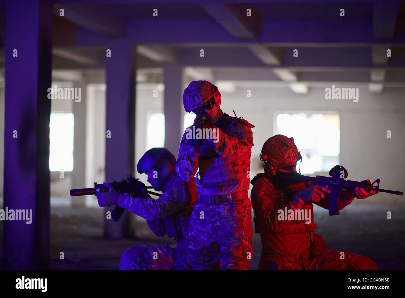 modern warfare soldiers team in tactical formation have action urban ...