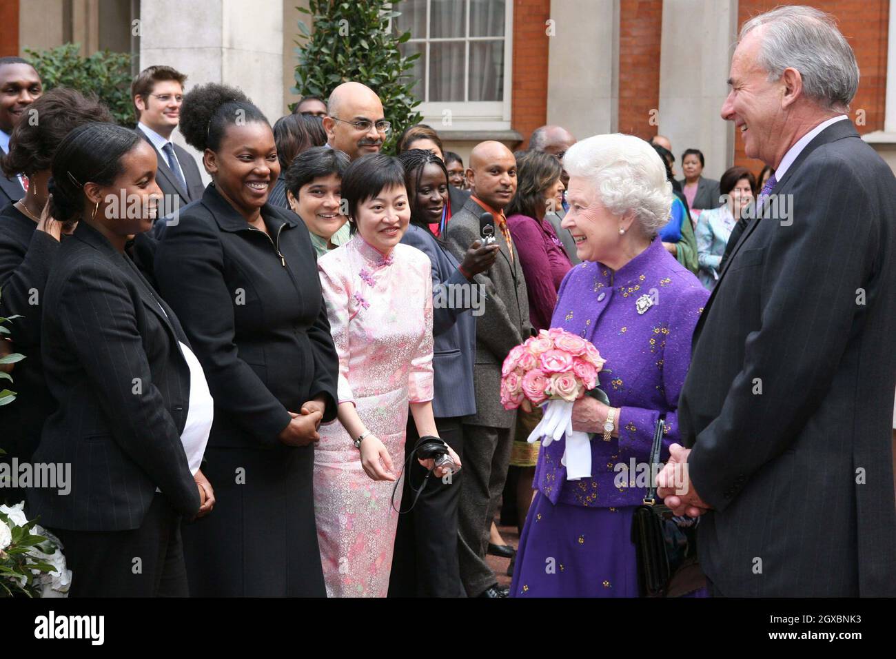 Queen Elizabeth II meets staff at Marlborough House Stock Photo - Alamy