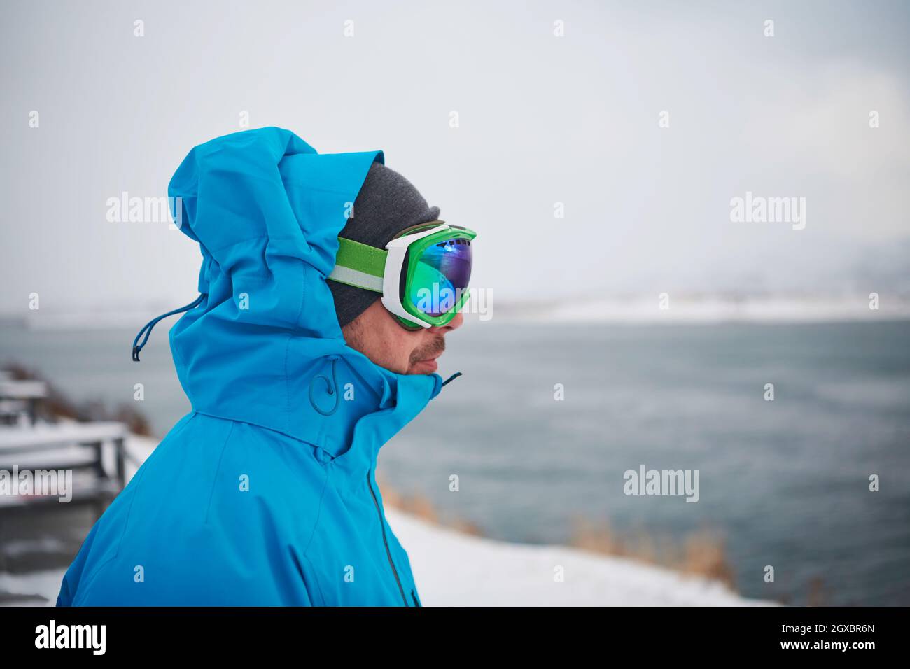 portrait local authentic eskimo man at winter in stormy weather wearing ...