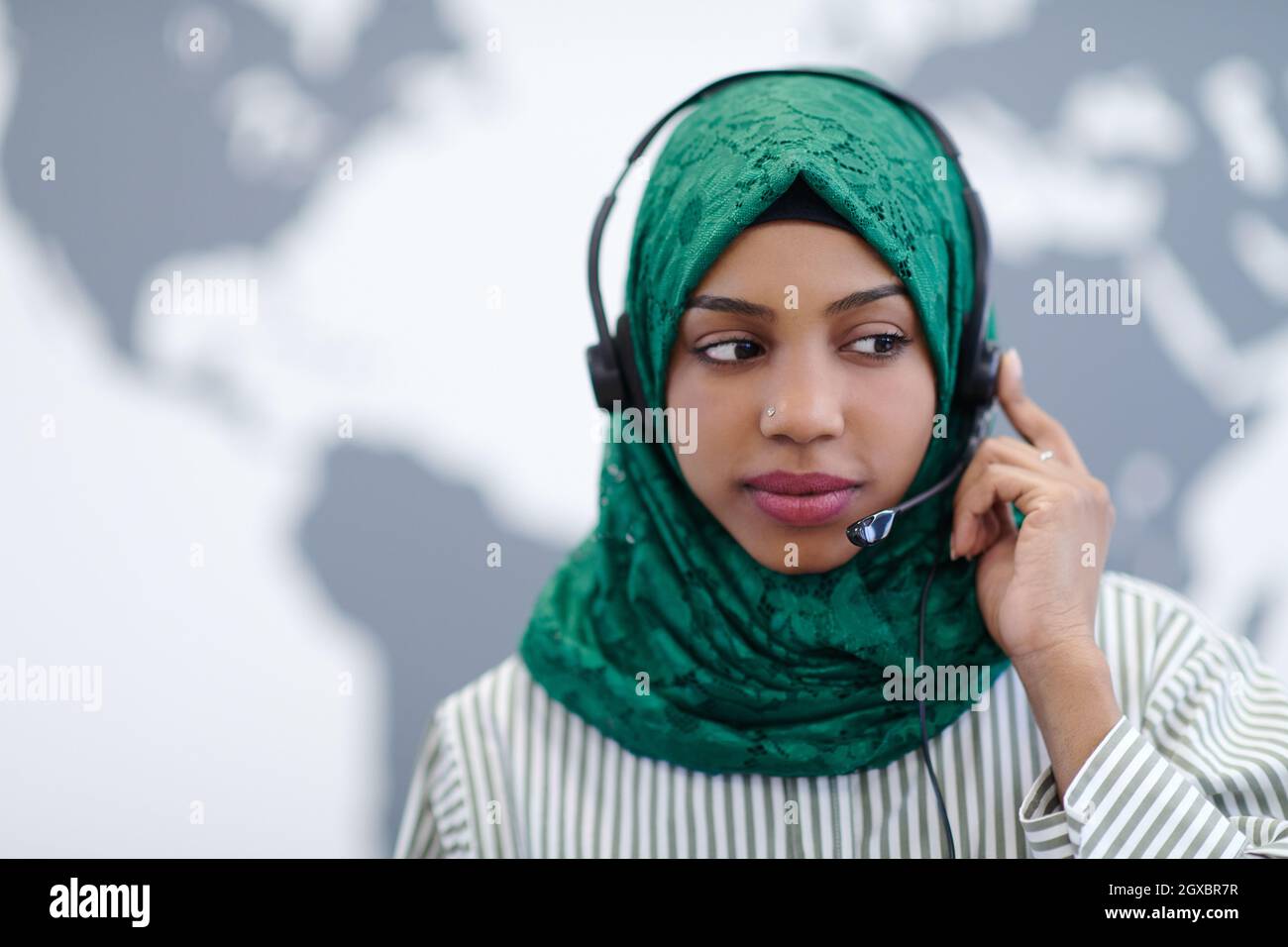 African muslim female with green hijab scarf customer representative ...