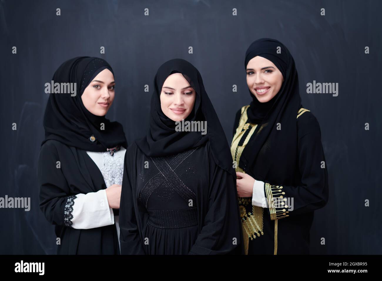 group portrait of beautiful muslim women in fashionable dress with ...