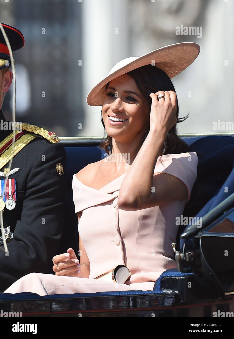 Megan, Duchess of Sussex leaves Buckingham Palace in an open carriage ...