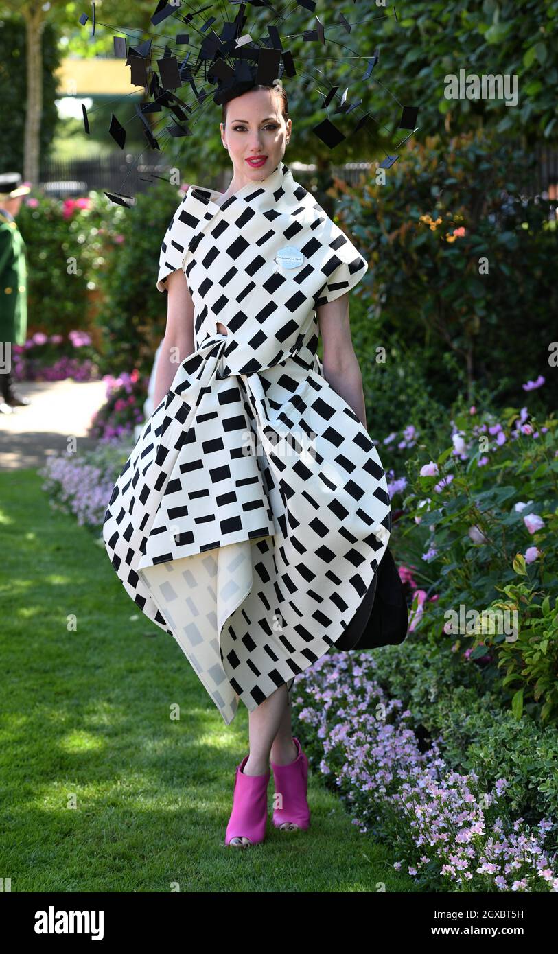 Jacqueline Appel poses for photographers in a black and white dress ...