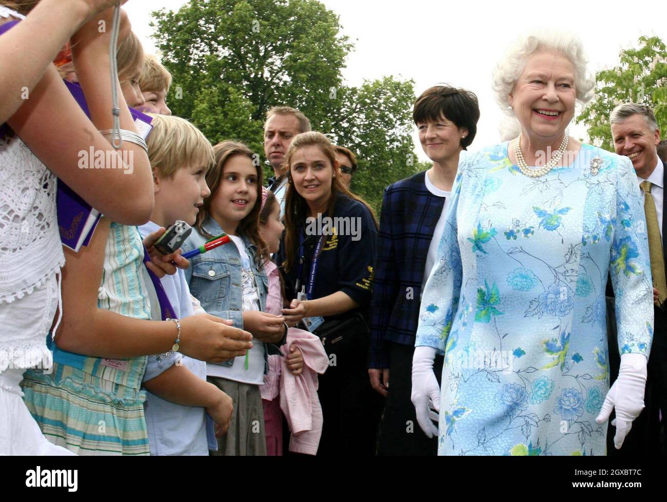 Queen Elizabeth II meets guests Stock Photo - Alamy