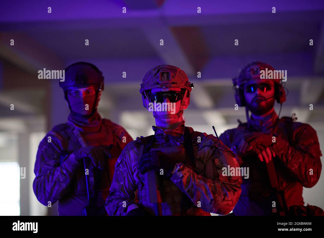 soldier squad team portrait in urban environment colored neon lights ...