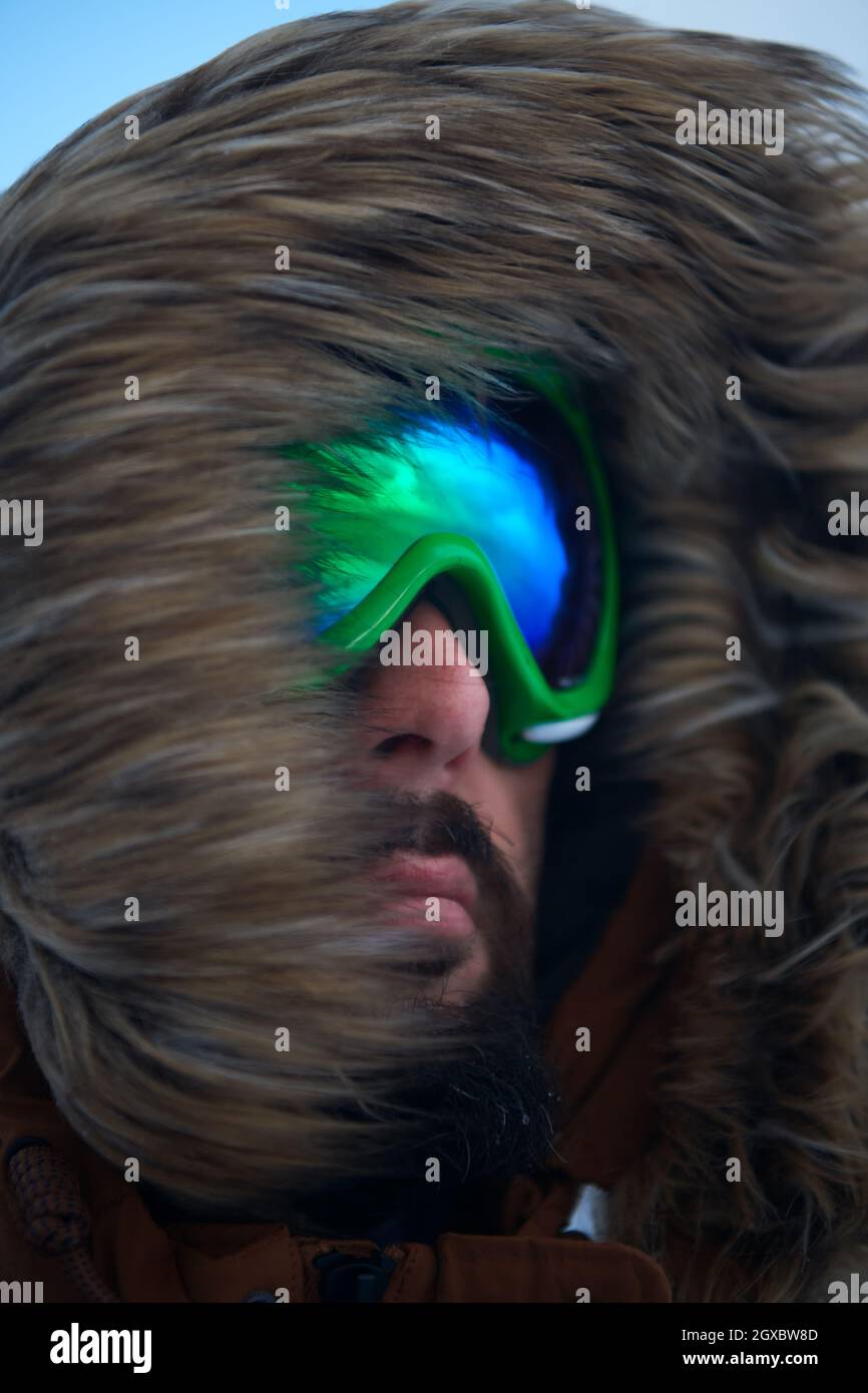 portrait local authentic eskimo man at winter in stormy weather wearing ...