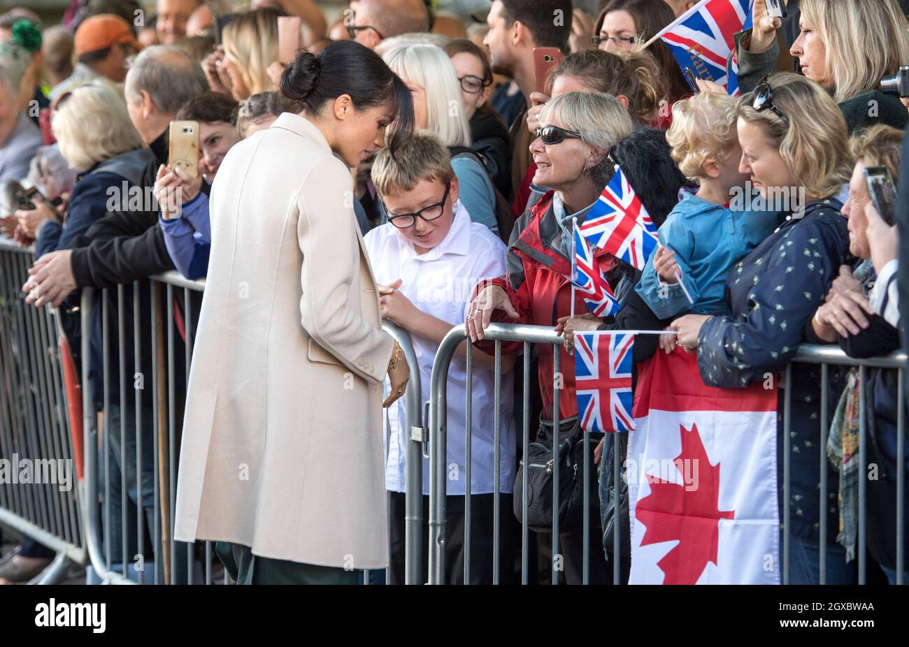 The Duke and Duchess of Sussex depart during a visit to the University ...
