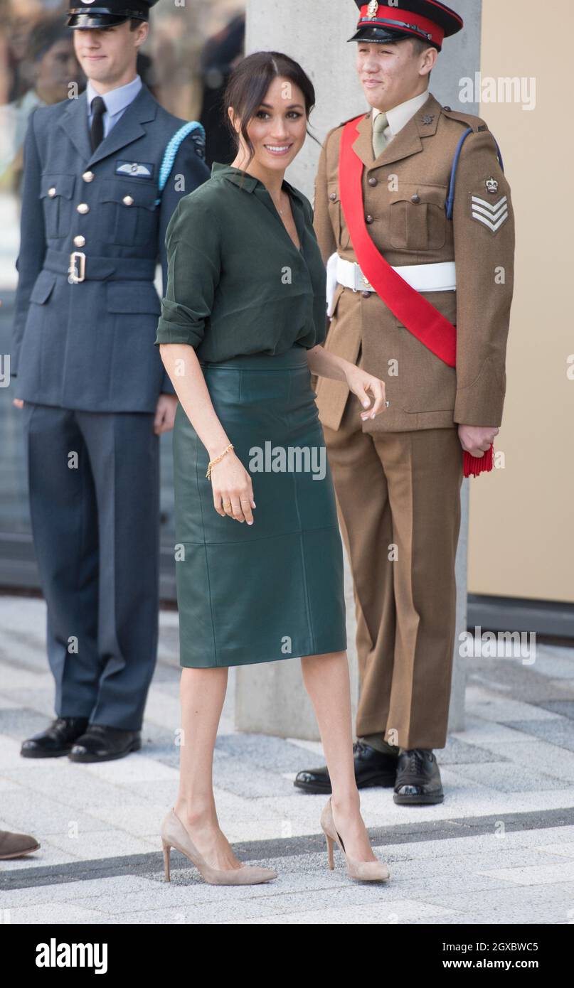 The Duke and Duchess of Sussex depart during a visit to the University ...