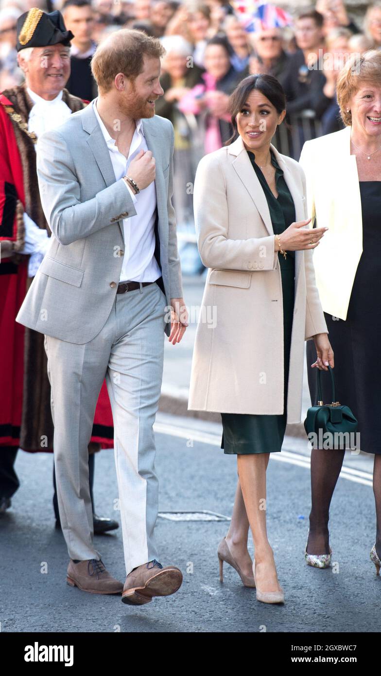 The Duke and Duchess of Sussex depart during a visit to the University ...