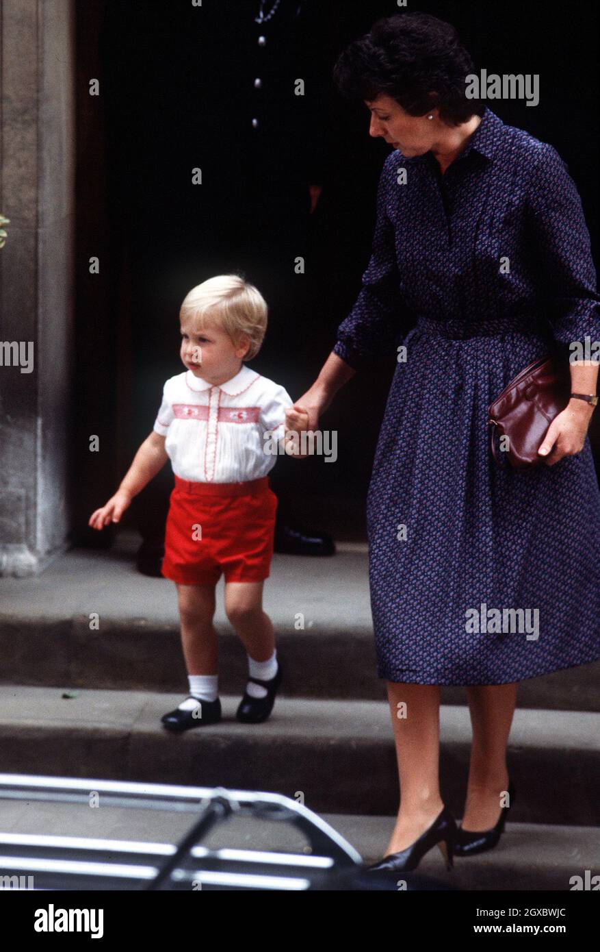 A young Prince William, accompanied by nanny Barbara Barnes, leaves St ...