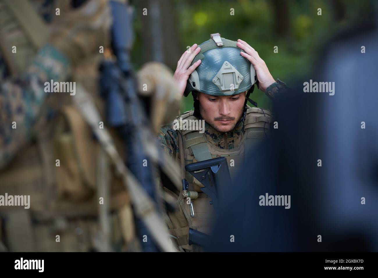 american marine corps special operations soldier preparing tactical and ...