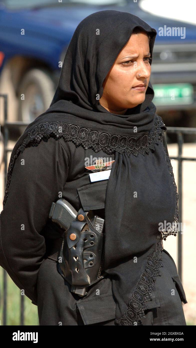 Pakistani security woman with a gun protects Prince Charles, Prince of ...