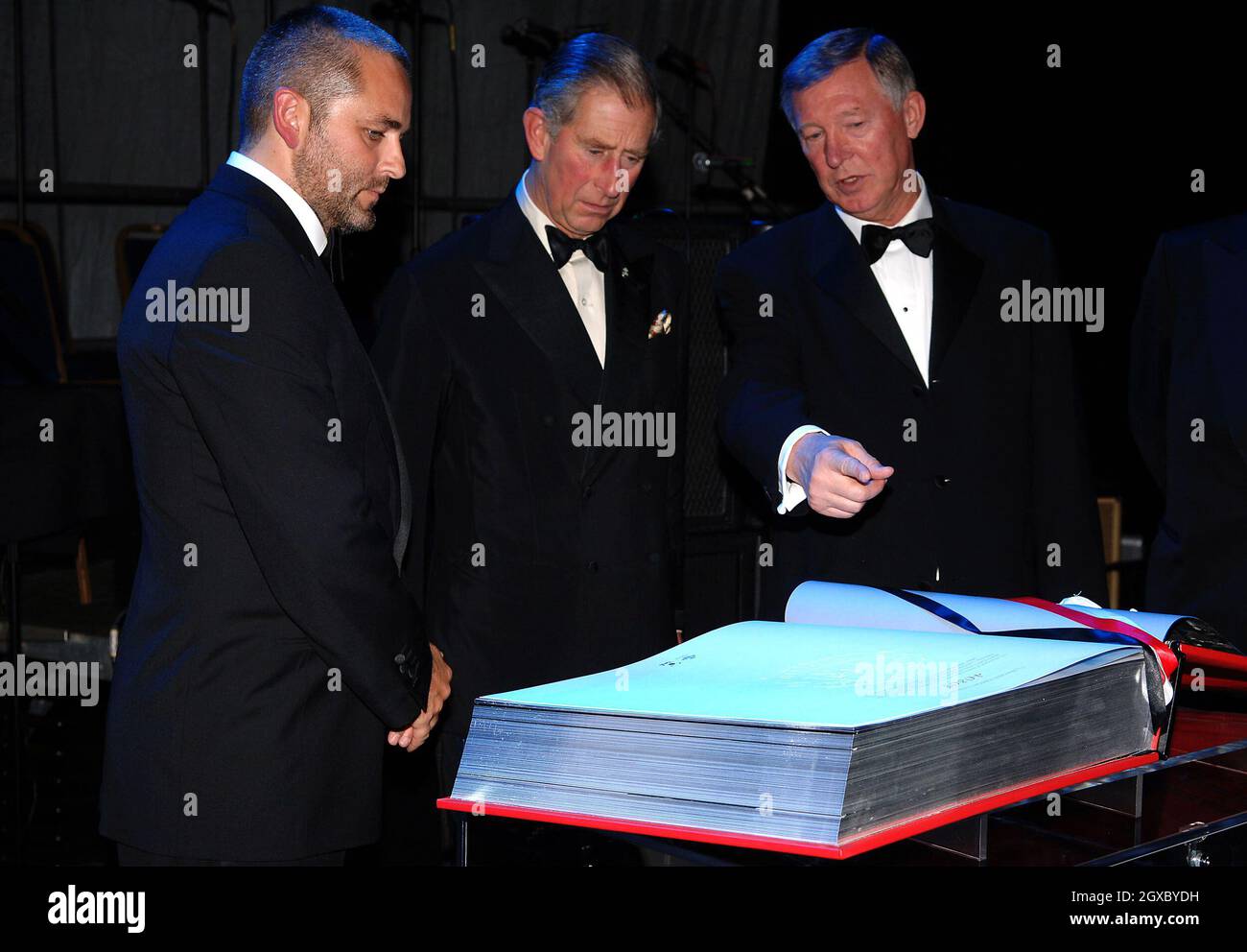 Prince Charles, Prince of Wales, Sir Alex Ferguson and Karl Fowler look ...