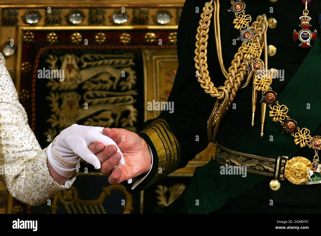 Queen Elizabeth II and Prince Philip, Duke of Edinburgh hold hands at ...