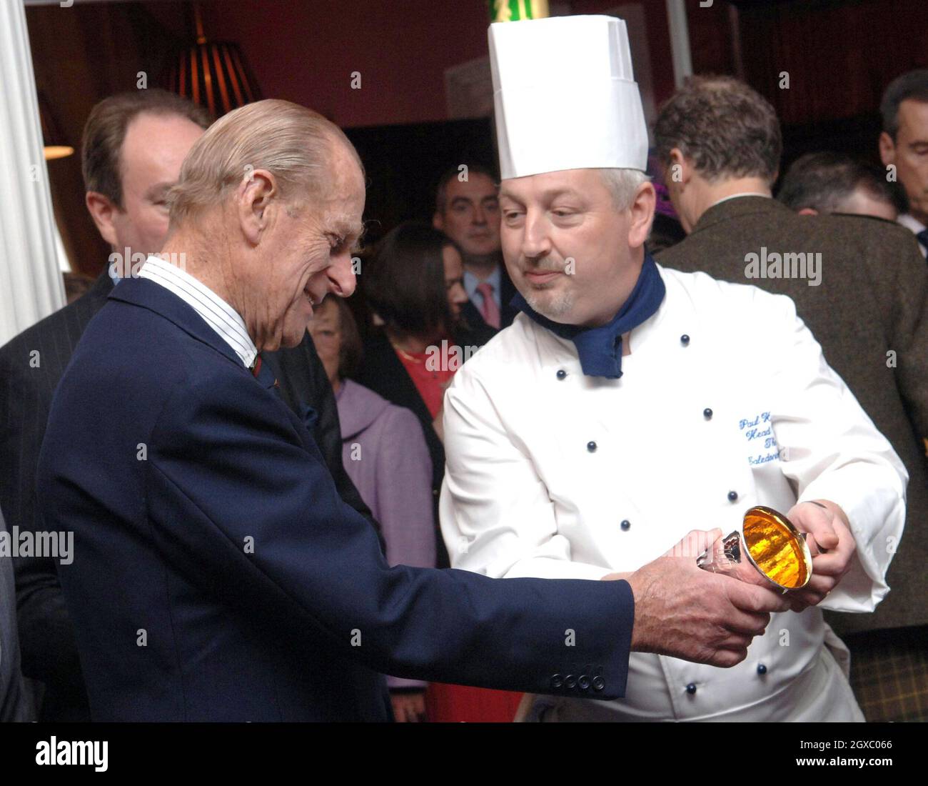 Prince Philip, Duke of Edinburgh receives a tankard from chef Paul ...