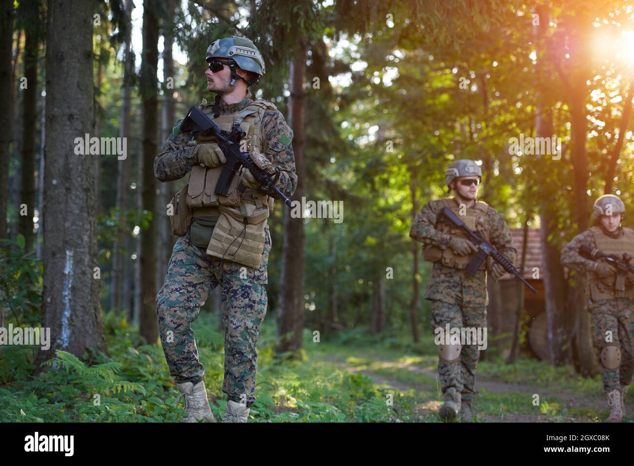 Modern warfare Soldiers Squad Running as Team in Battle Formation Stock ...