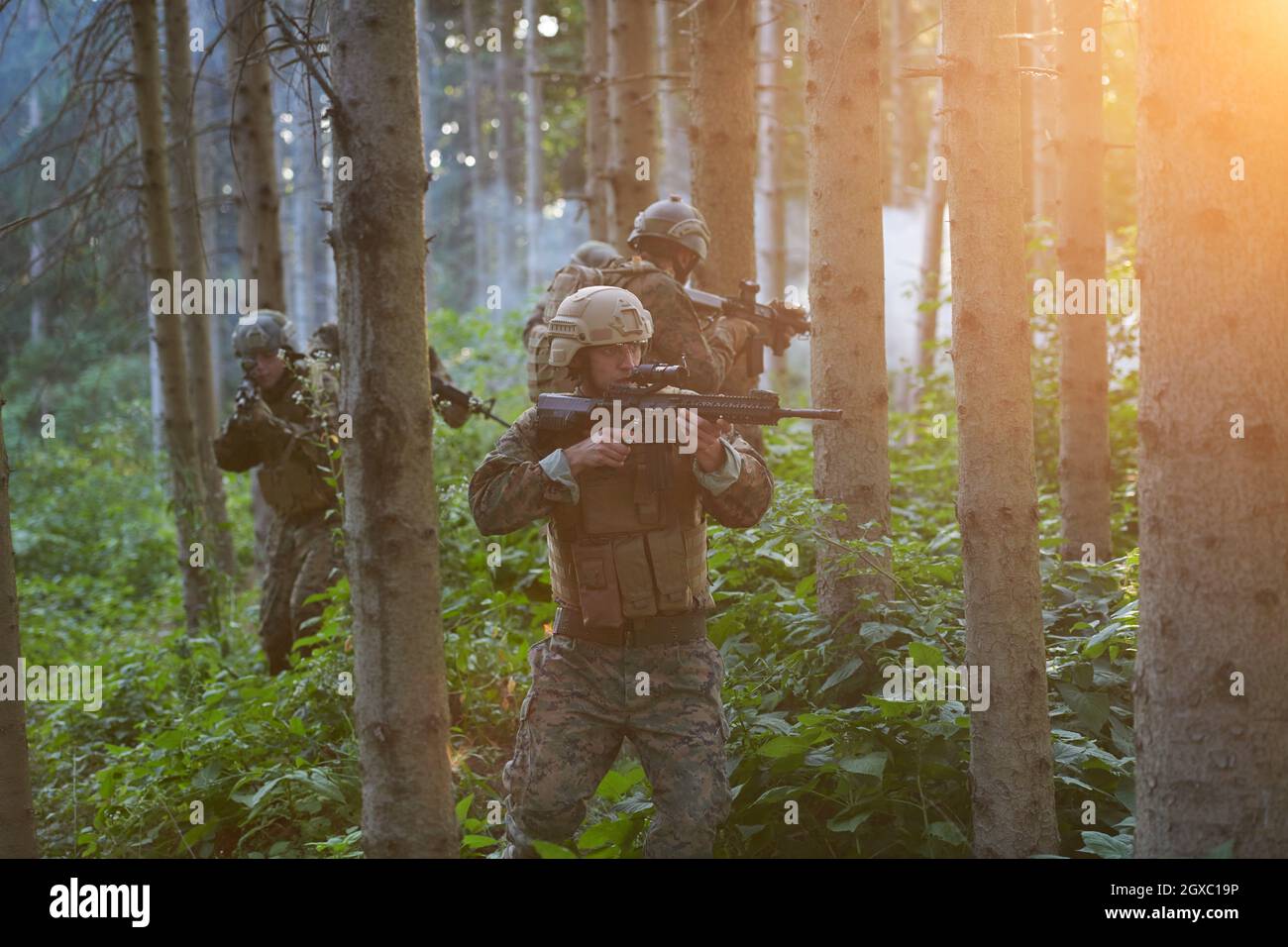 Modern warfare Soldiers Squad Running as Team in Battle Formation Stock ...