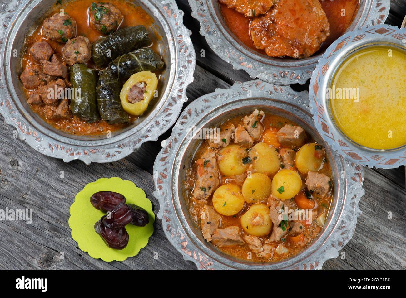 Eid Mubarak Traditional Ramadan Iftar dinner. Assorted tasty food in ...