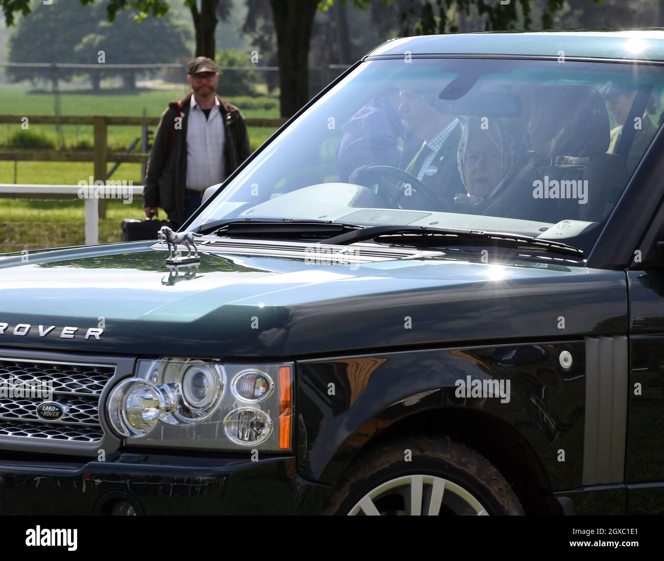 Queen Elizabeth arrives driving a Range Rover to attend the Royal ...