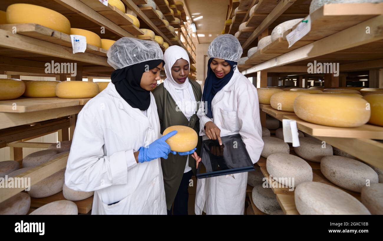 middle eastern black african muslim female business woman team in local ...