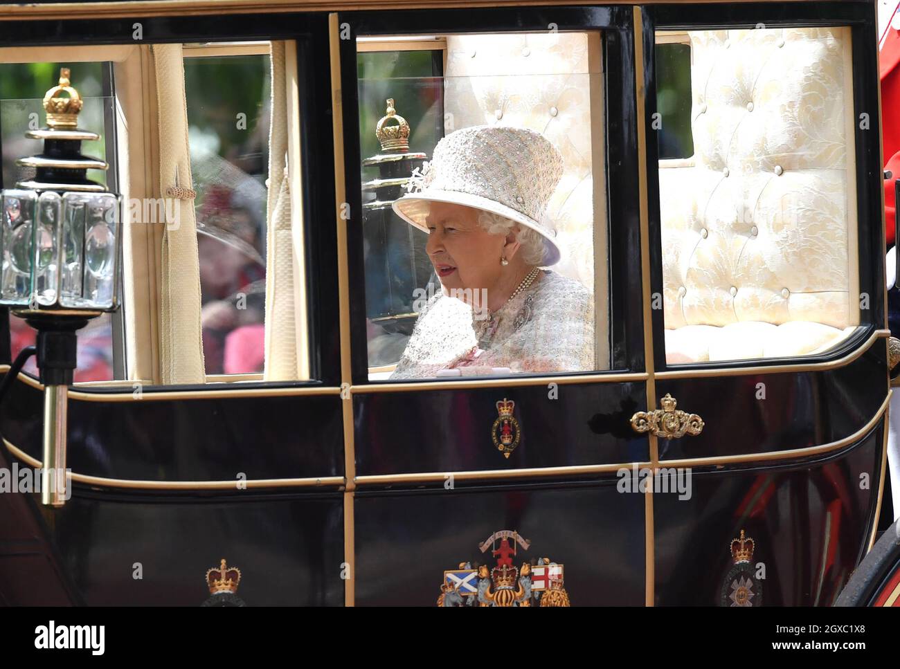 Queen Elizabeth ll rides in the Scottish State Coach during Trooping ...